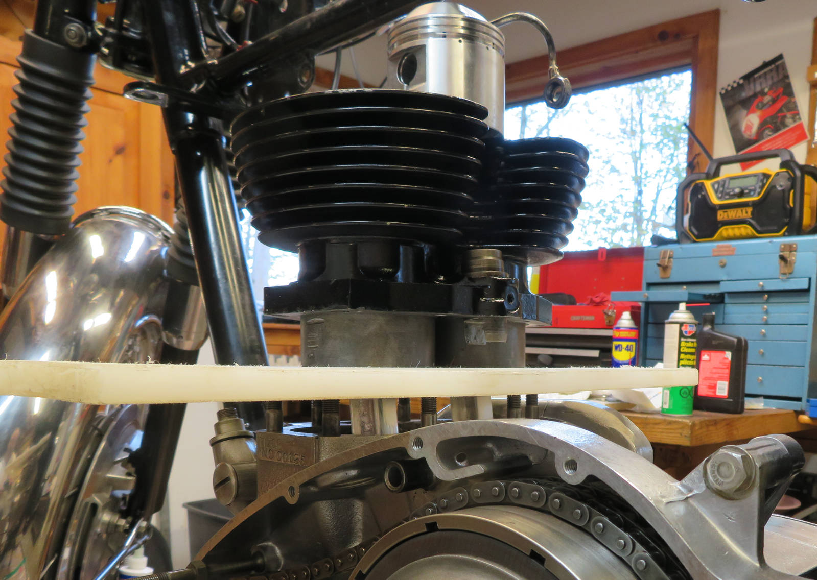 Installing Cylinders over Pistons Using a Piston Board